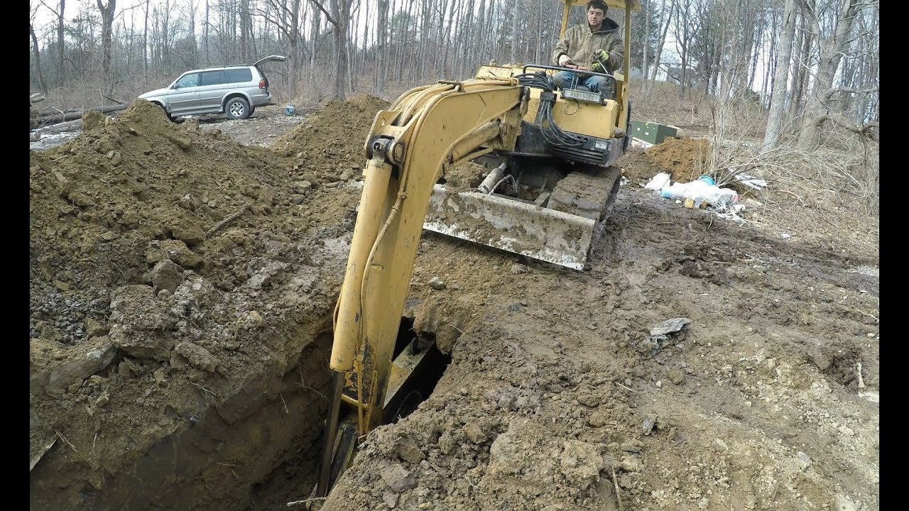 Digging under frost for a new electric service - YouTube