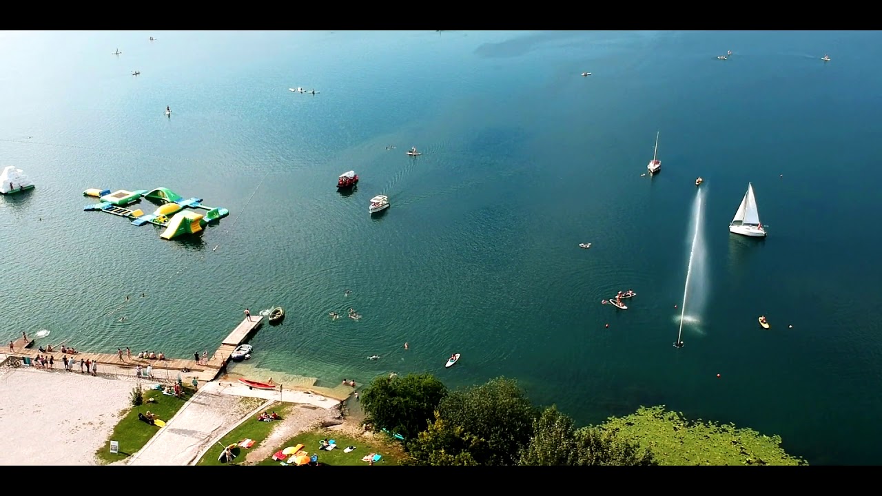 Lake Velenje (Velenjsko jezero) shot from a drone - YouTube