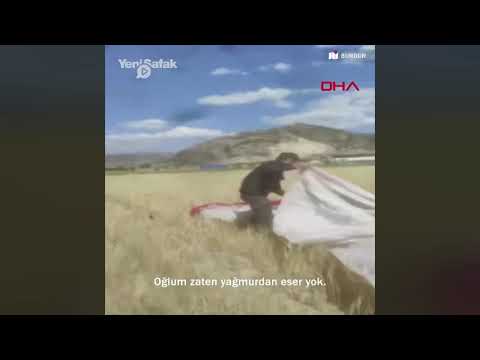 Paraşütle tarlaya iniş yaparken tarla sahibine yakalandı