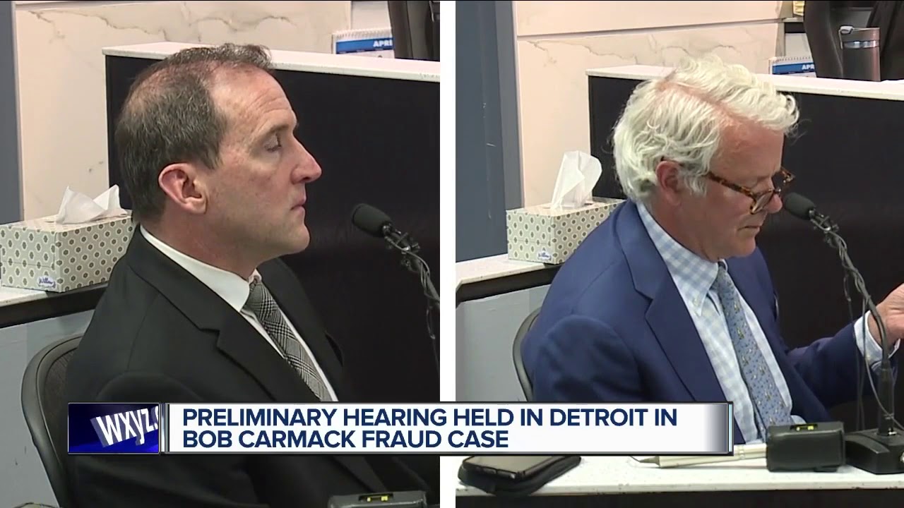 Two new banners fly over Detroit in feud between businessman Bob ...