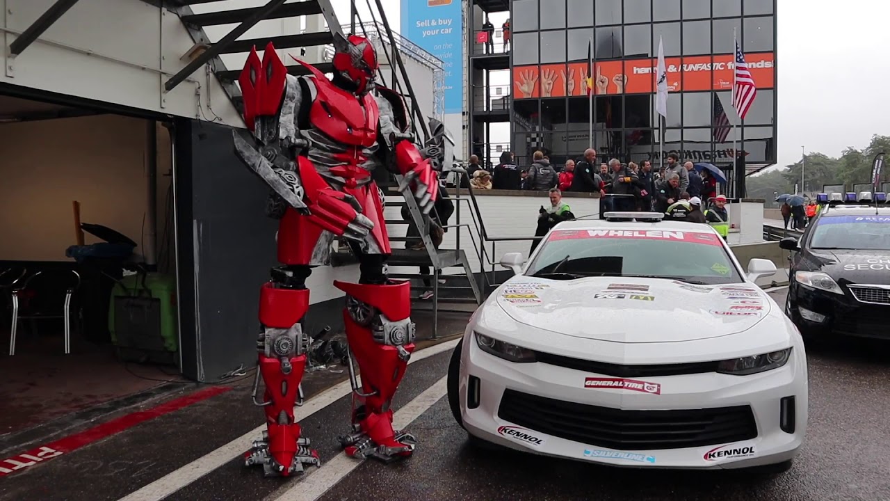 Giant Robot Dino VS Nascar American Festival Zolder - YouTube