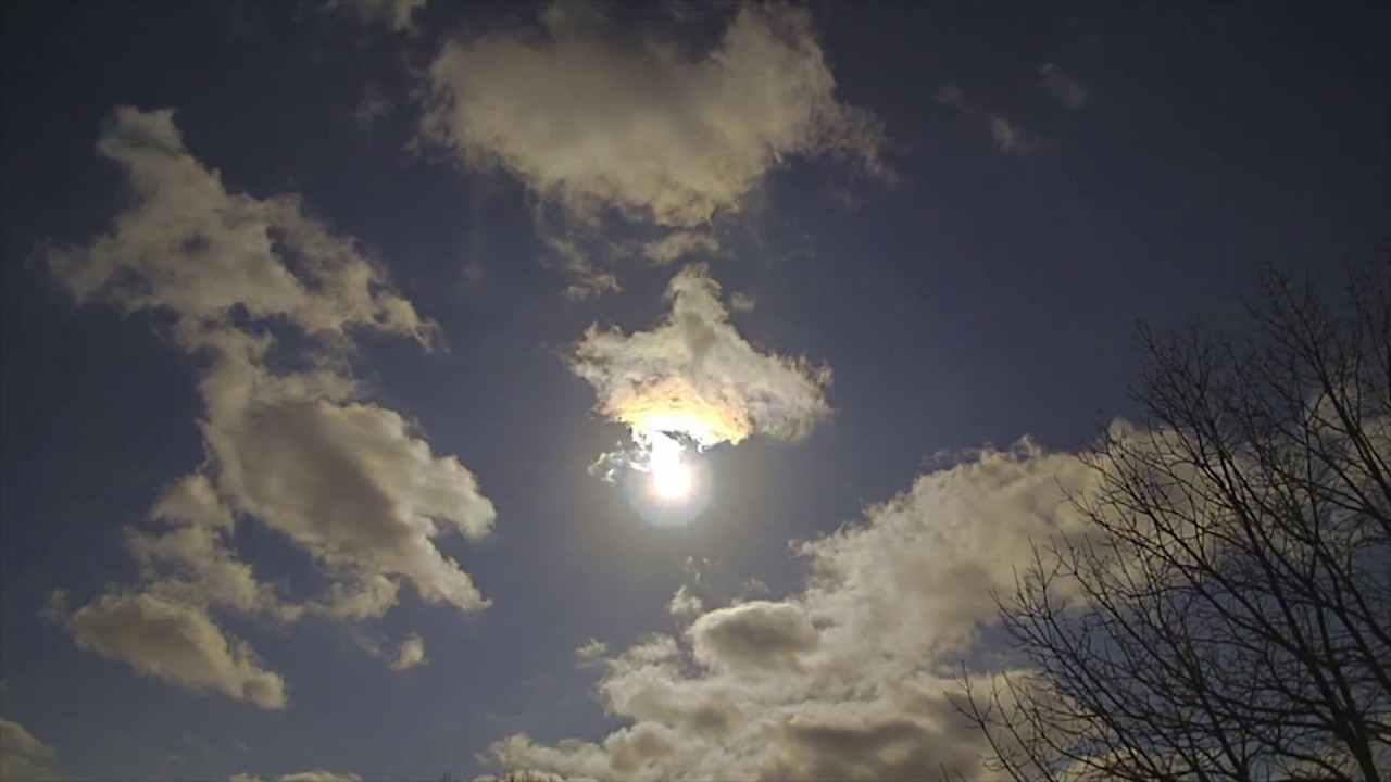 The clouds dancing around the sun, Time-Lapse - YouTube
