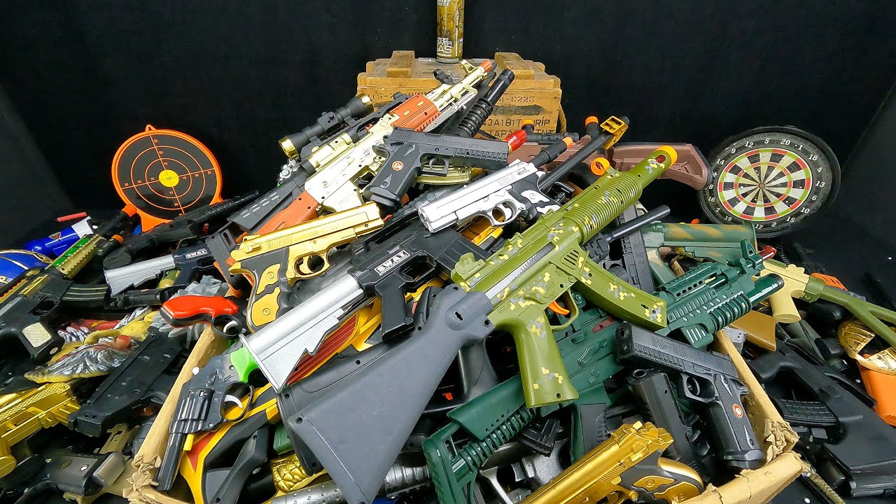 A Huge Hill of Toy Guns and Rifles, Toy Guns, Shotguns and Sniper ...