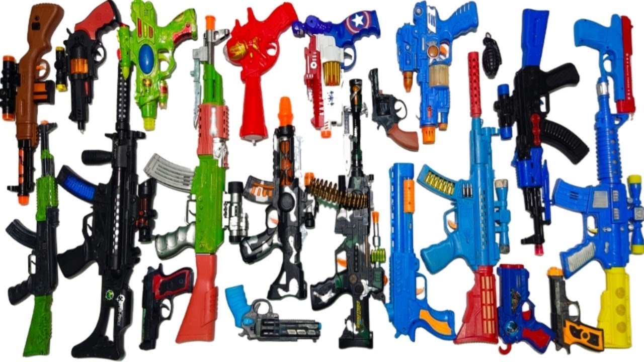 collection of 7 assault weapons, 1 machine gun, M4a1, M16, Shot Gun ...