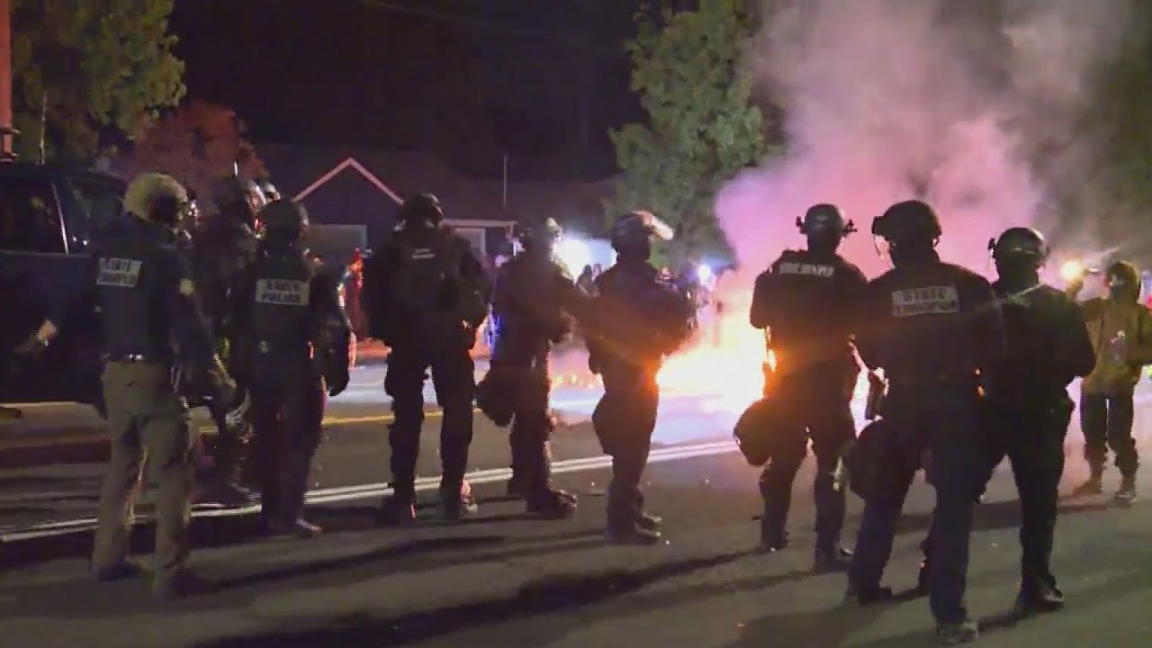 Riot declared on 100th night of protests - YouTube