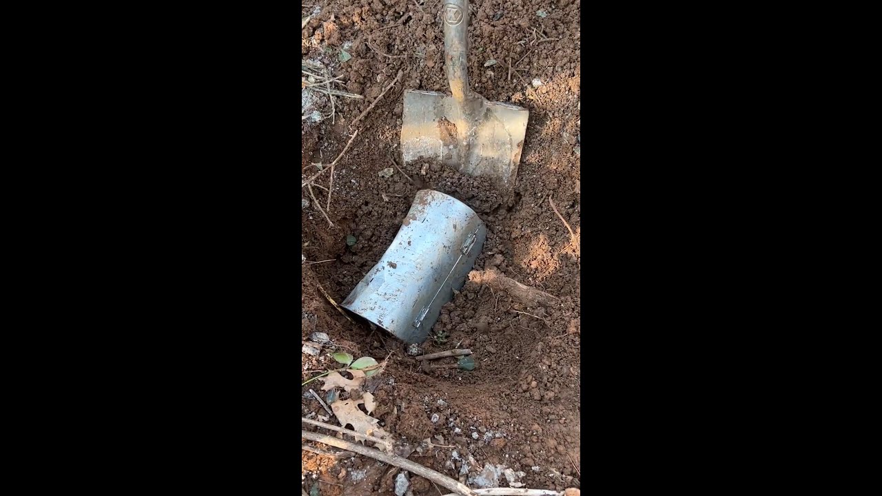 Guy finds something valuable hidden buried in his back yard - YouTube