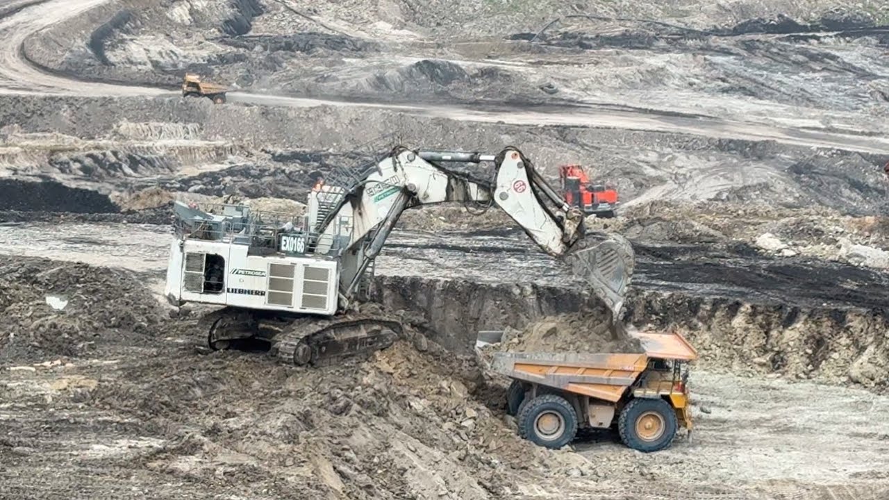 Liebherr R9350 Hydraulic Excavator Working on loading hard working ...