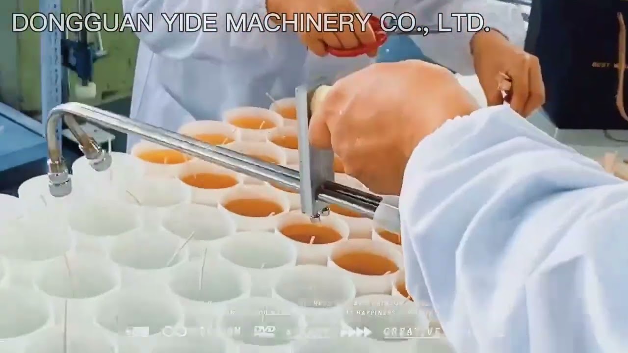 Semi-automatic wax filling machine for candle - YouTube