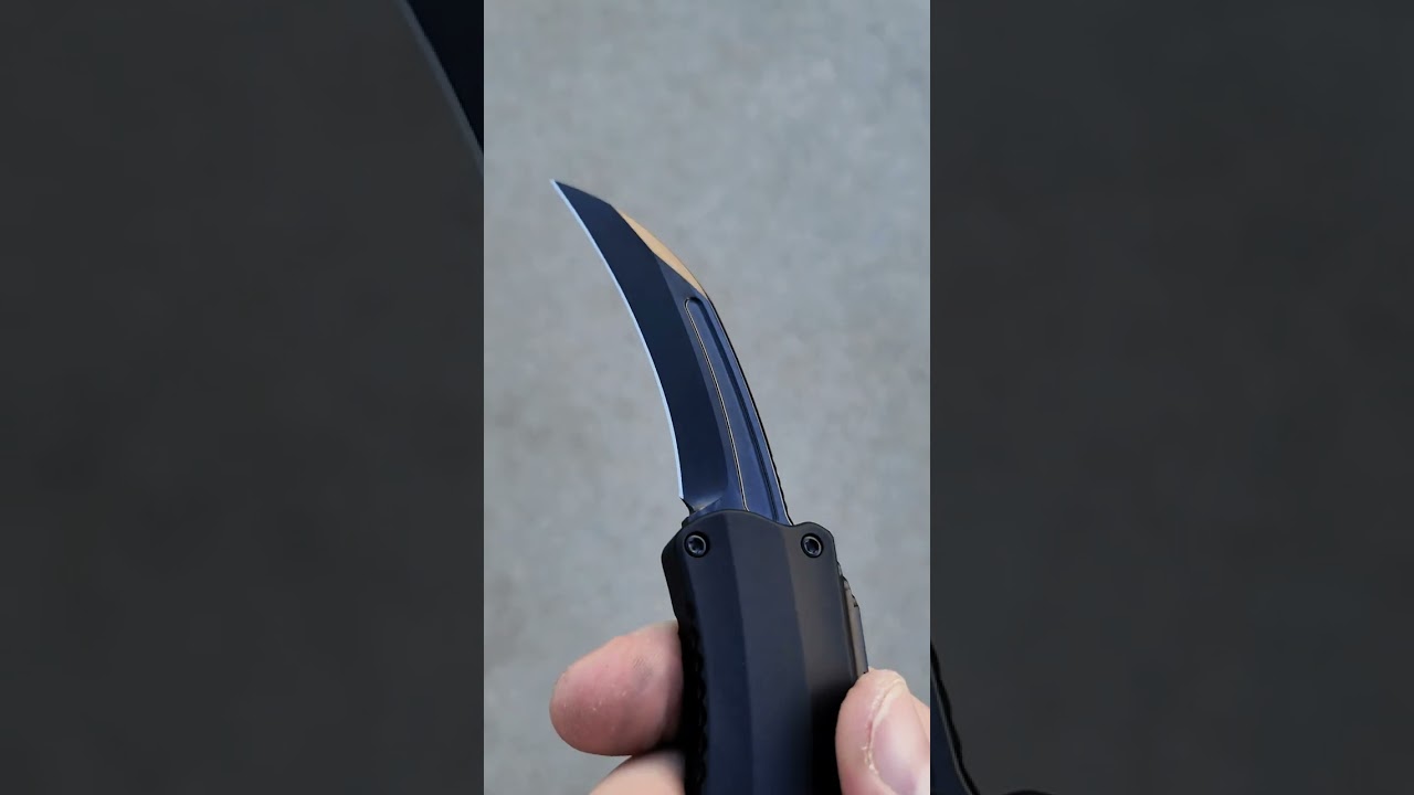 They Made A Curved OTF Switchblade Knife? #shorts - YouTube