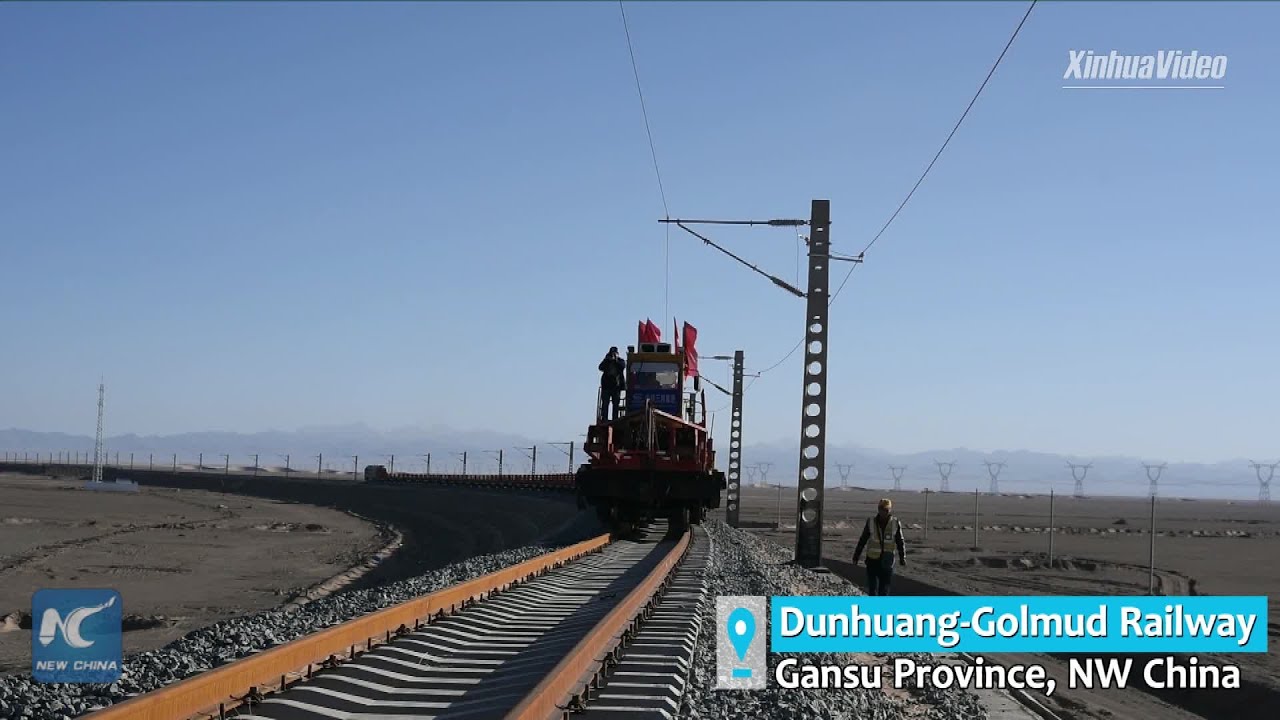 Track-laying of Dunhuang-Golmud Railway completes in NW China - YouTube