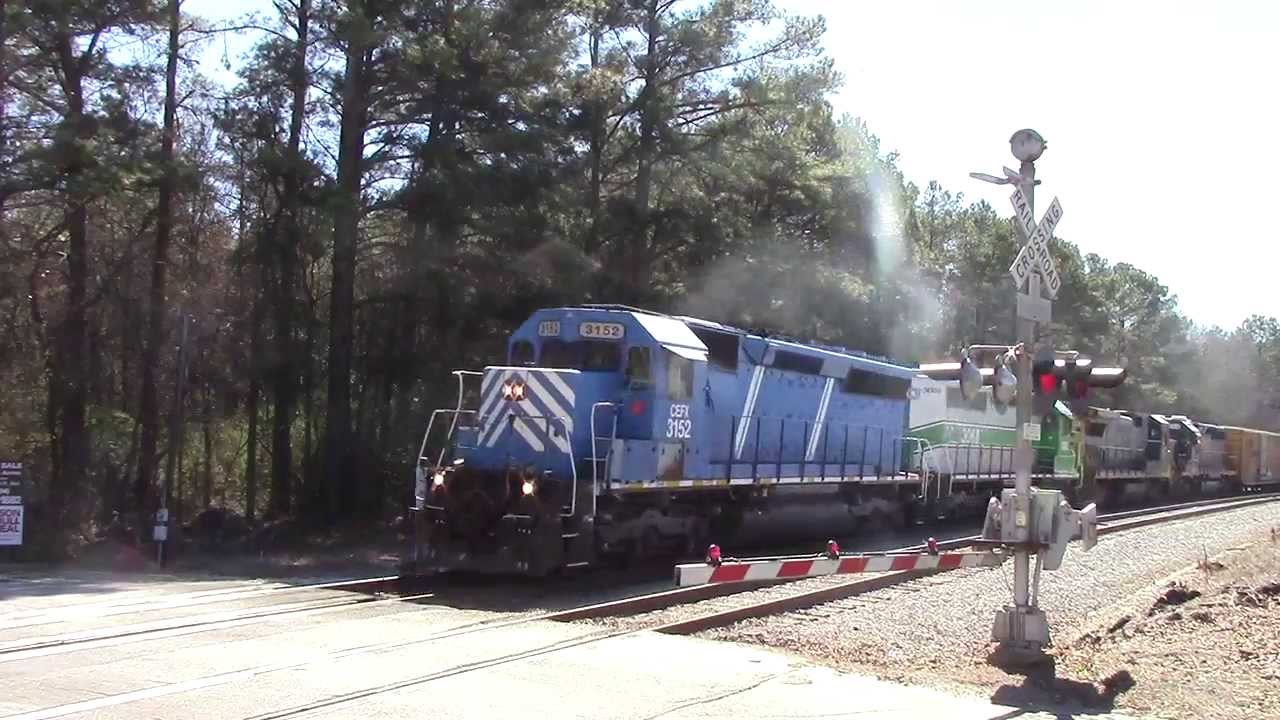 CSX Q550-26 with CEFX & CITX Leasers, an Ex. CR 8-40B and a CSX SD40-2 2/27/14 - YouTube