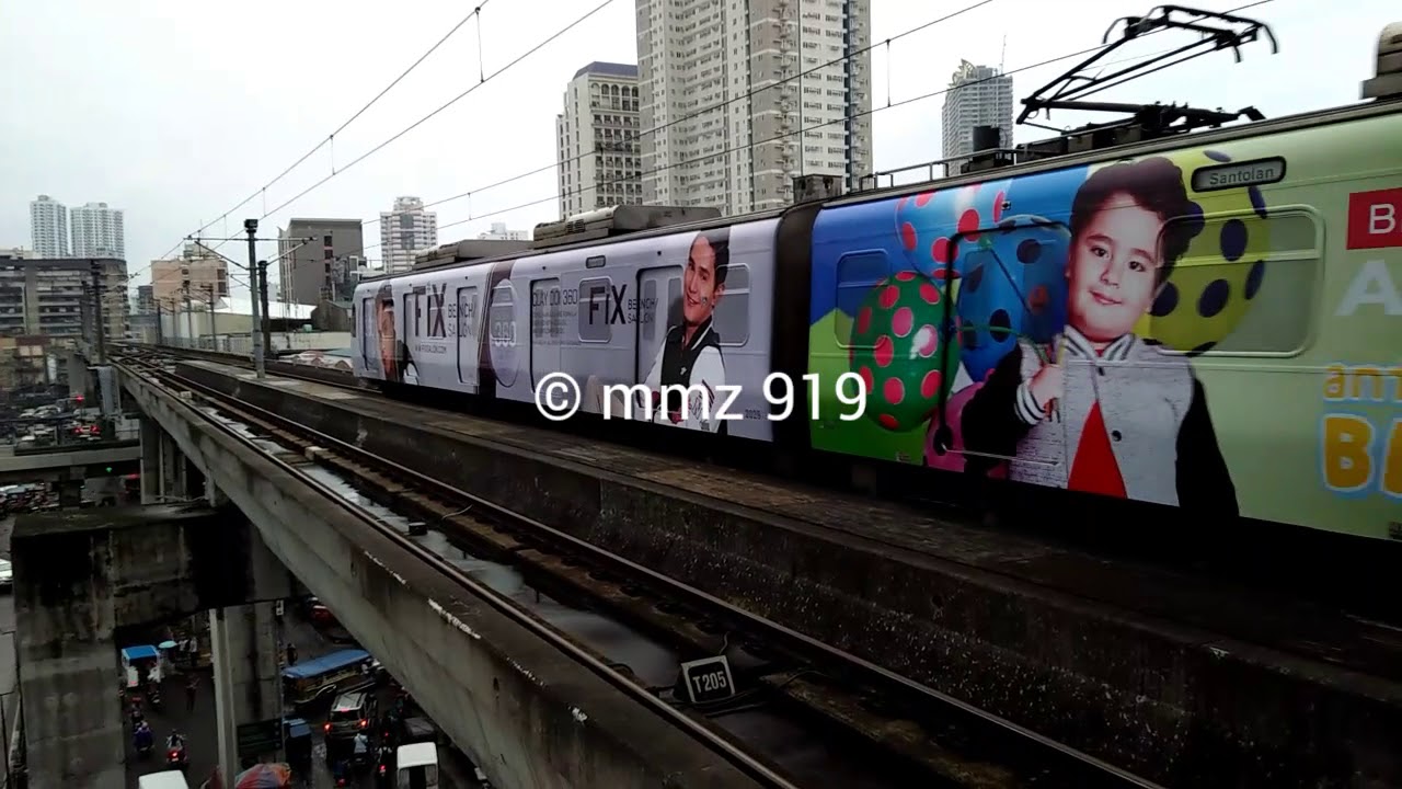 LRT-2/LRTA Trainset no. 8 with new Bench wrap ads leaving Recto Station ...
