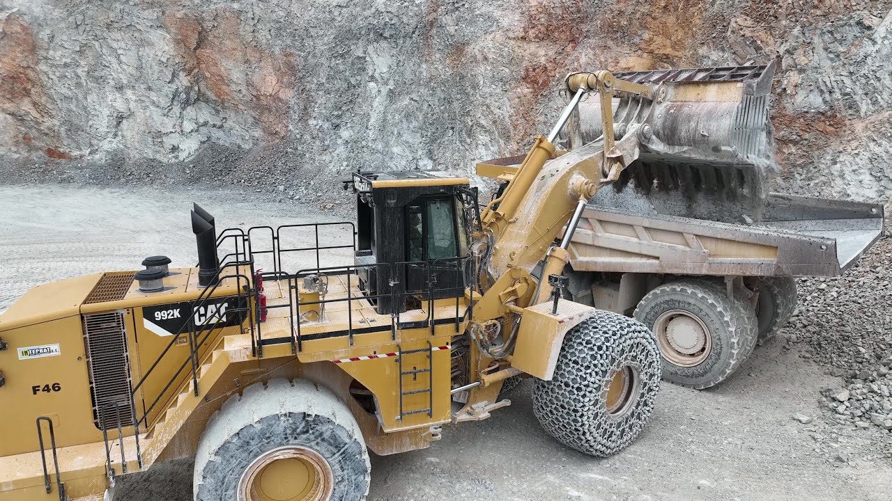 Caterpillar 992K Wheel Loader Loading Caterpillar 777F Dumpers Aerial ...