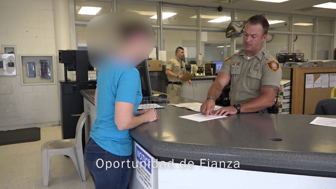 David L. Moss Criminal Justice Center Booking Video (Spanish) - YouTube