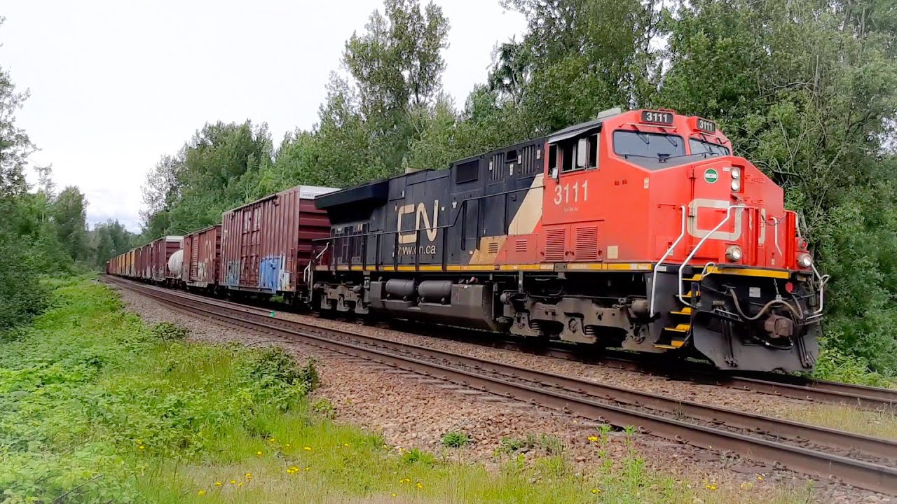CN 3111 Tier 4 ET44AC Leads Freight Train w/DPU Abrahamson British ...