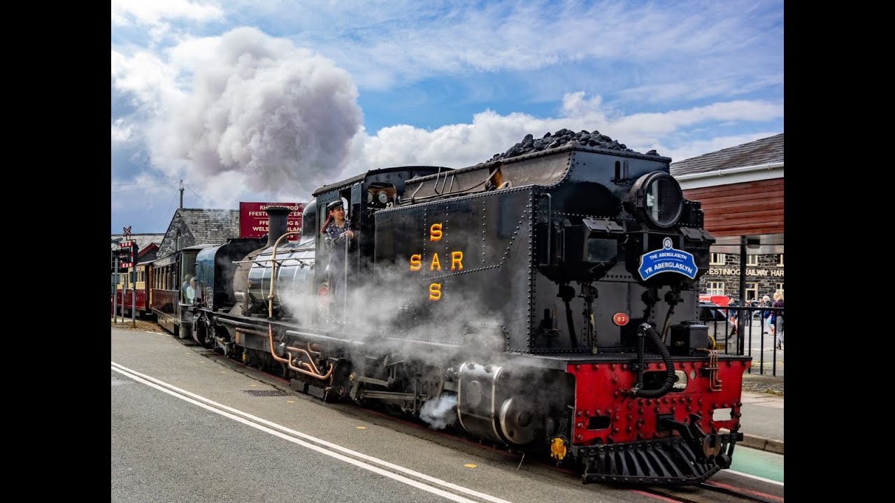 NG/G16 No.87 Narrow Gauge steam locomotive departing from Porthmadog 19 ...