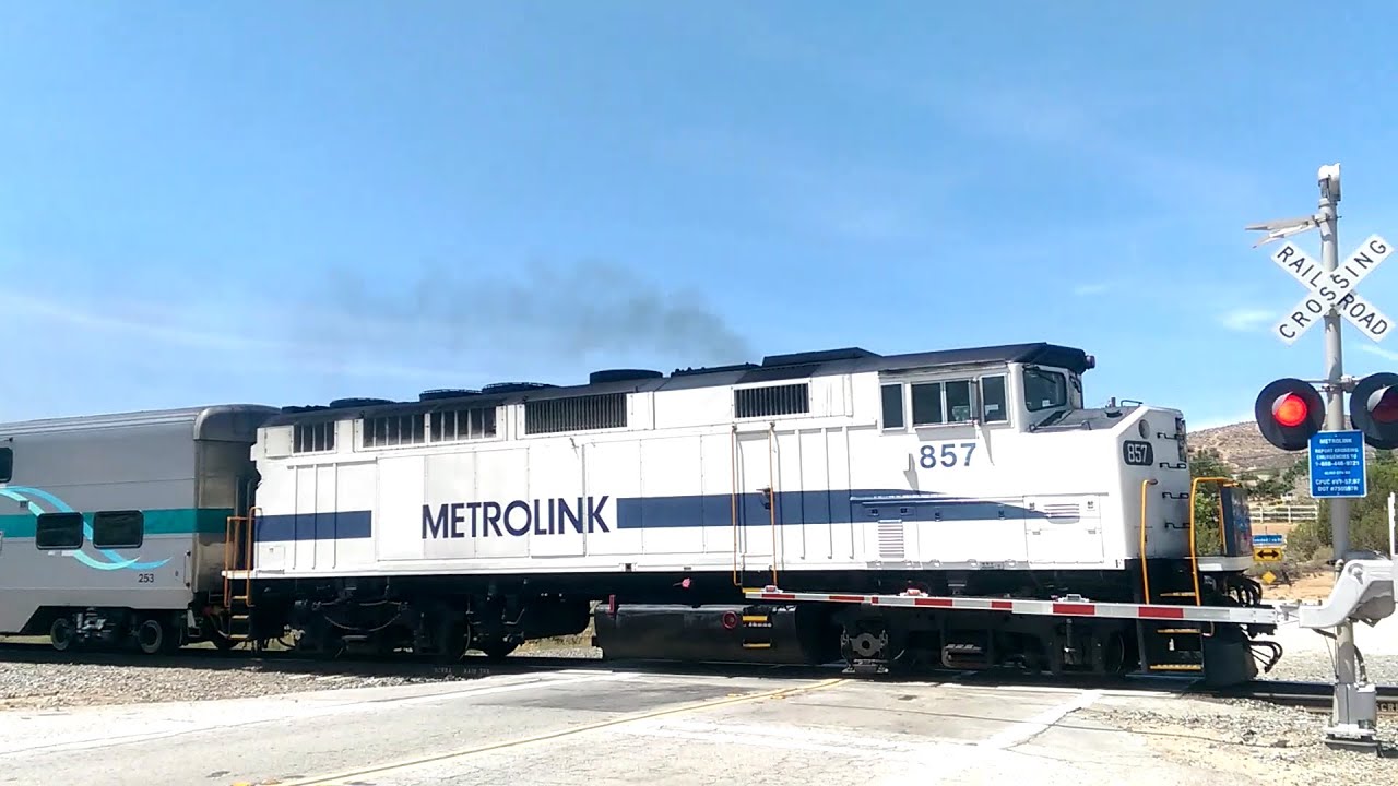 SCAX 857 leads Metrolink train 209 over Aliso Canyon Road on 08/28/2015 ...
