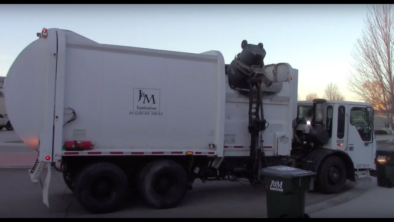 Sterling Condor 2nd Gen. McNeilus Autoreach Garbage Truck - YouTube