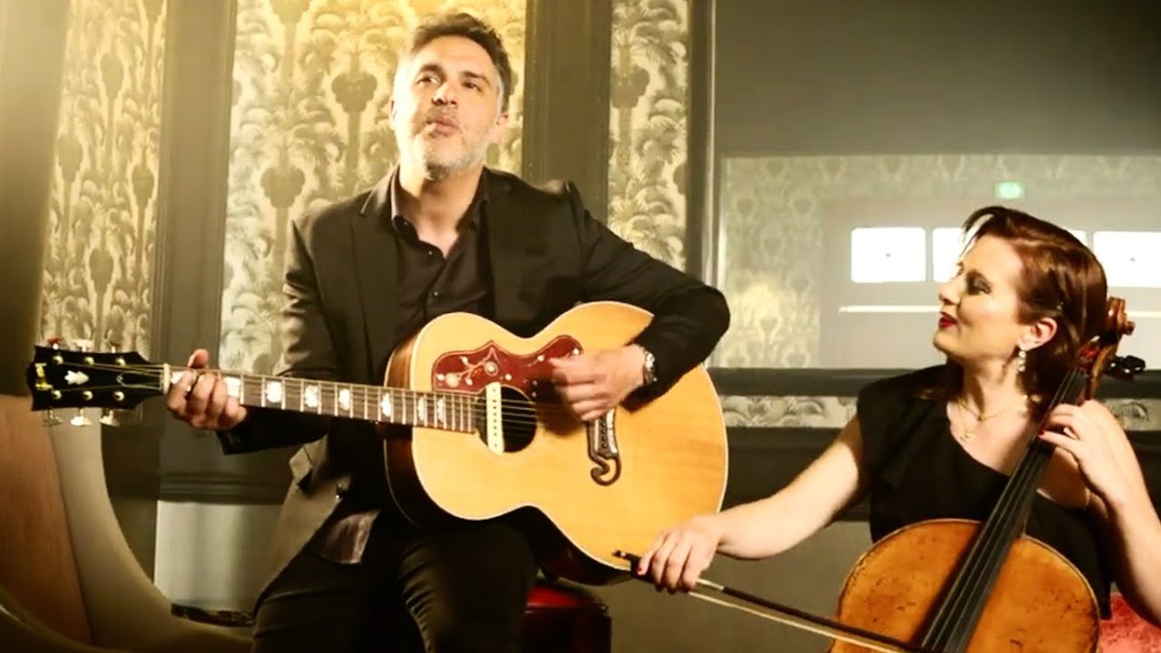 Duet guitarist/cello singers - YouTube
