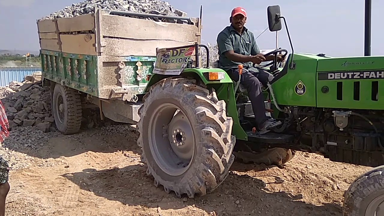 Heavy load haulage by Deutz-Fahr tractor - YouTube