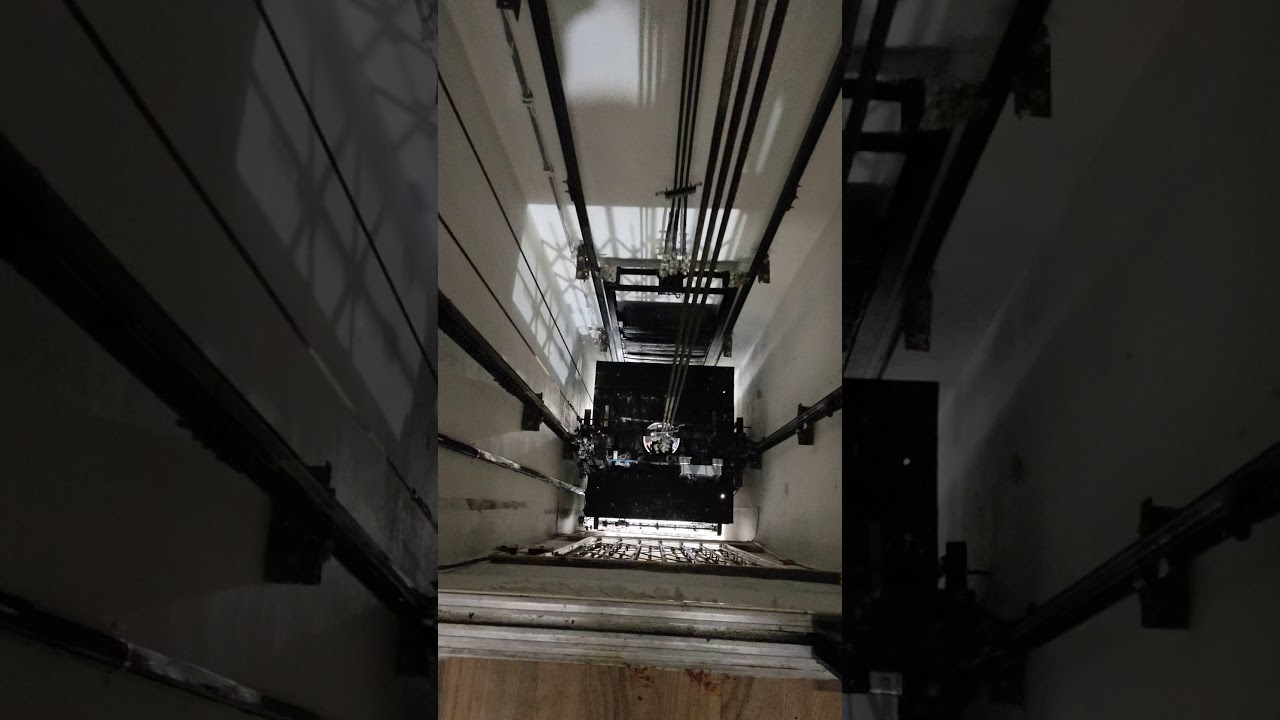 Jackson elevators manual collapsible gate lift - YouTube