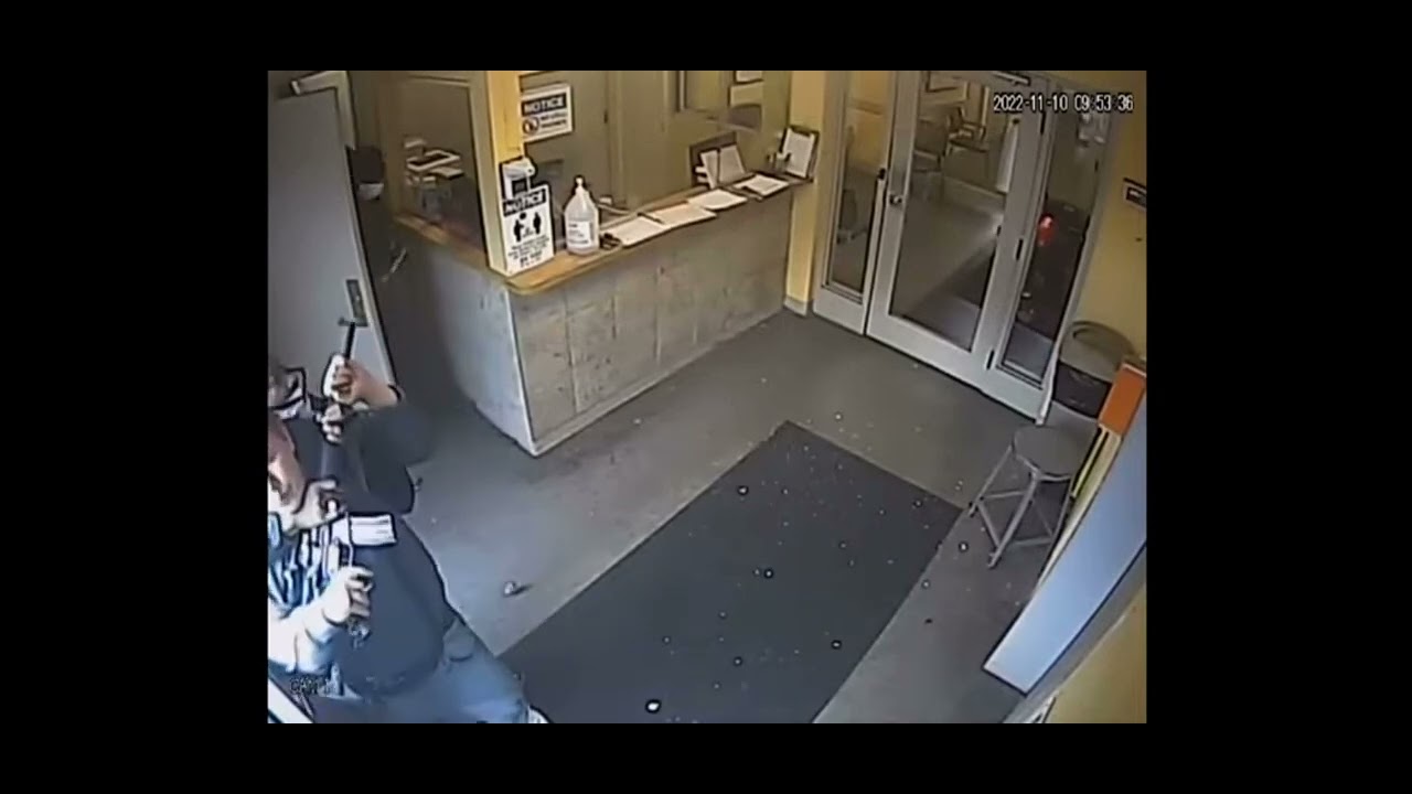 Armed man with ar gets tackled by security - YouTube