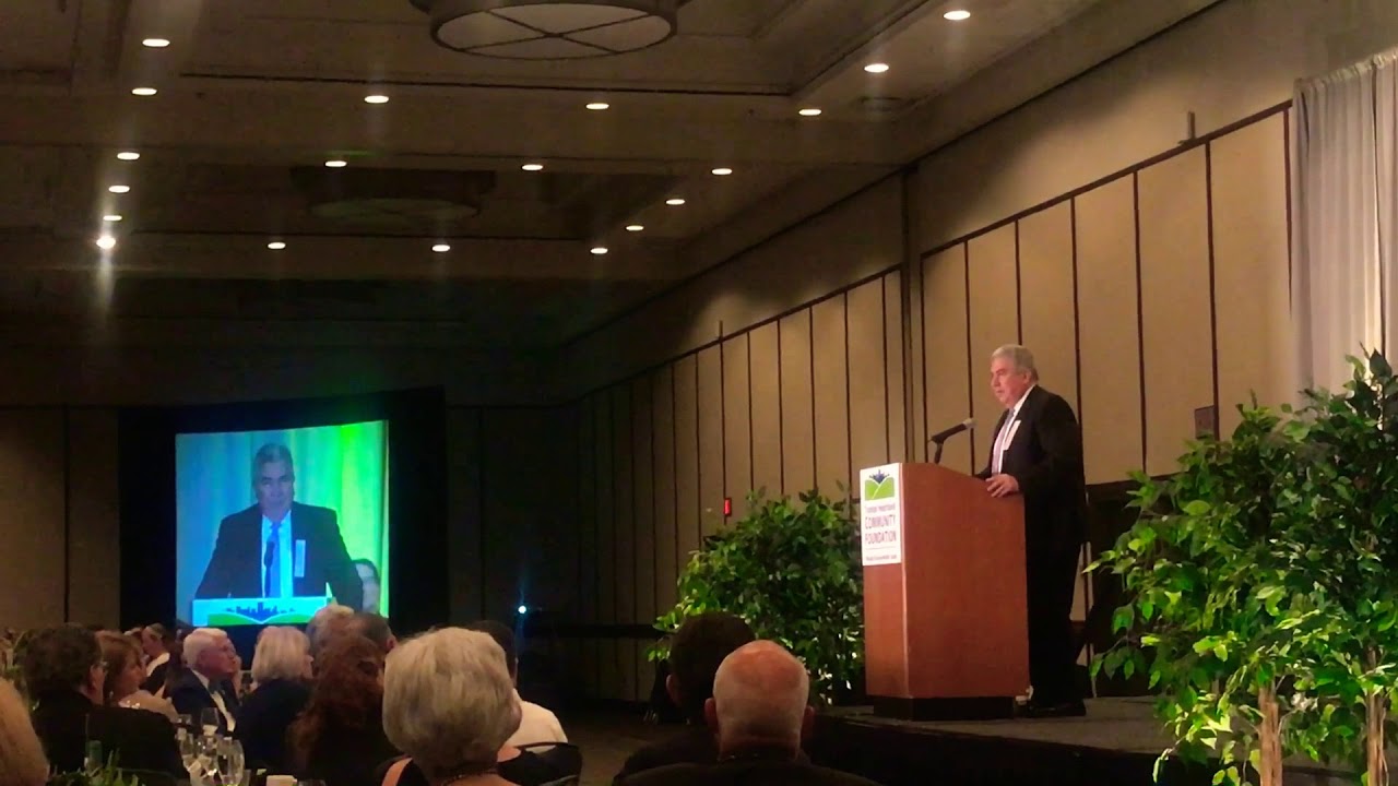 Carlos Ledezma accepting the Corporate Citizen Award for Cable Dahmer ...