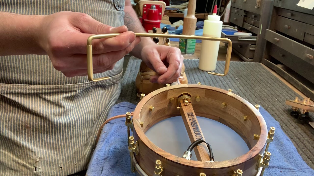 Adding a brass wire armrest to a banjo ukulele. - YouTube