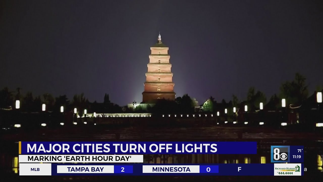 Major cities worldwide turn off lights to mark "Earth Hour Day" - YouTube
