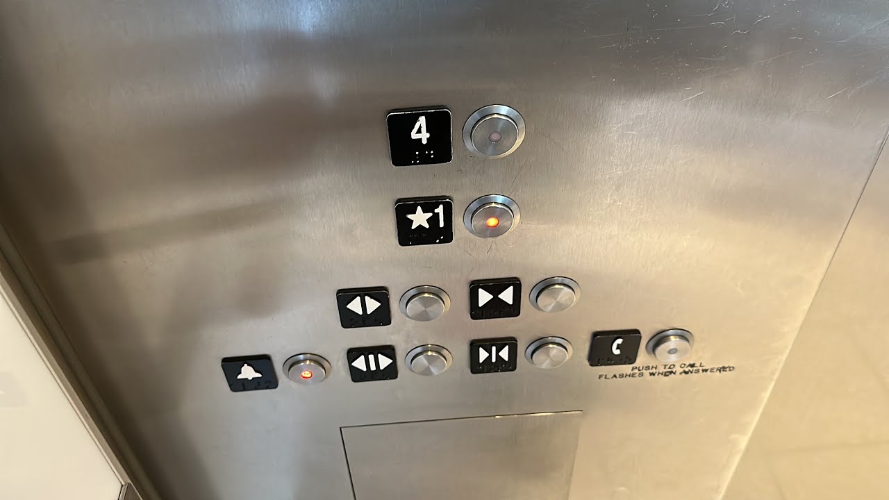 Schindler 5500 Green/Orange Train Elevators at Economy Deck- Tampa Intl. Airport- Tampa, FL, USA ...