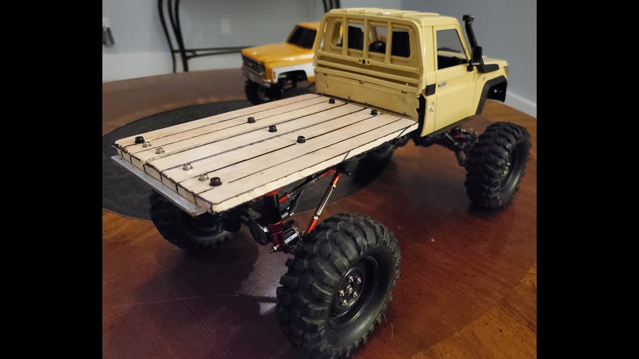 MN82 Toyota LC70 -- Wood Flatbed & Chassis stretch -- rock testing ...