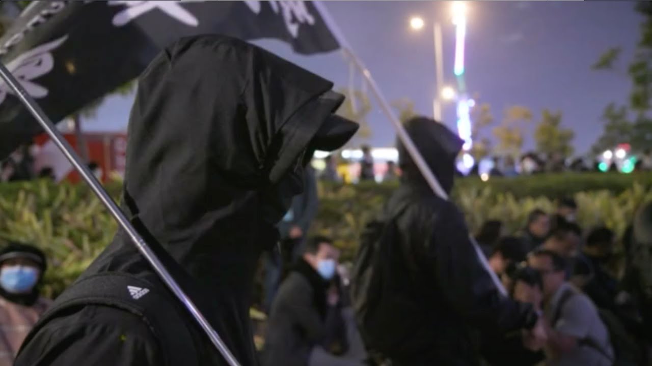 CGTN's exclusive interview with black clad protester - YouTube