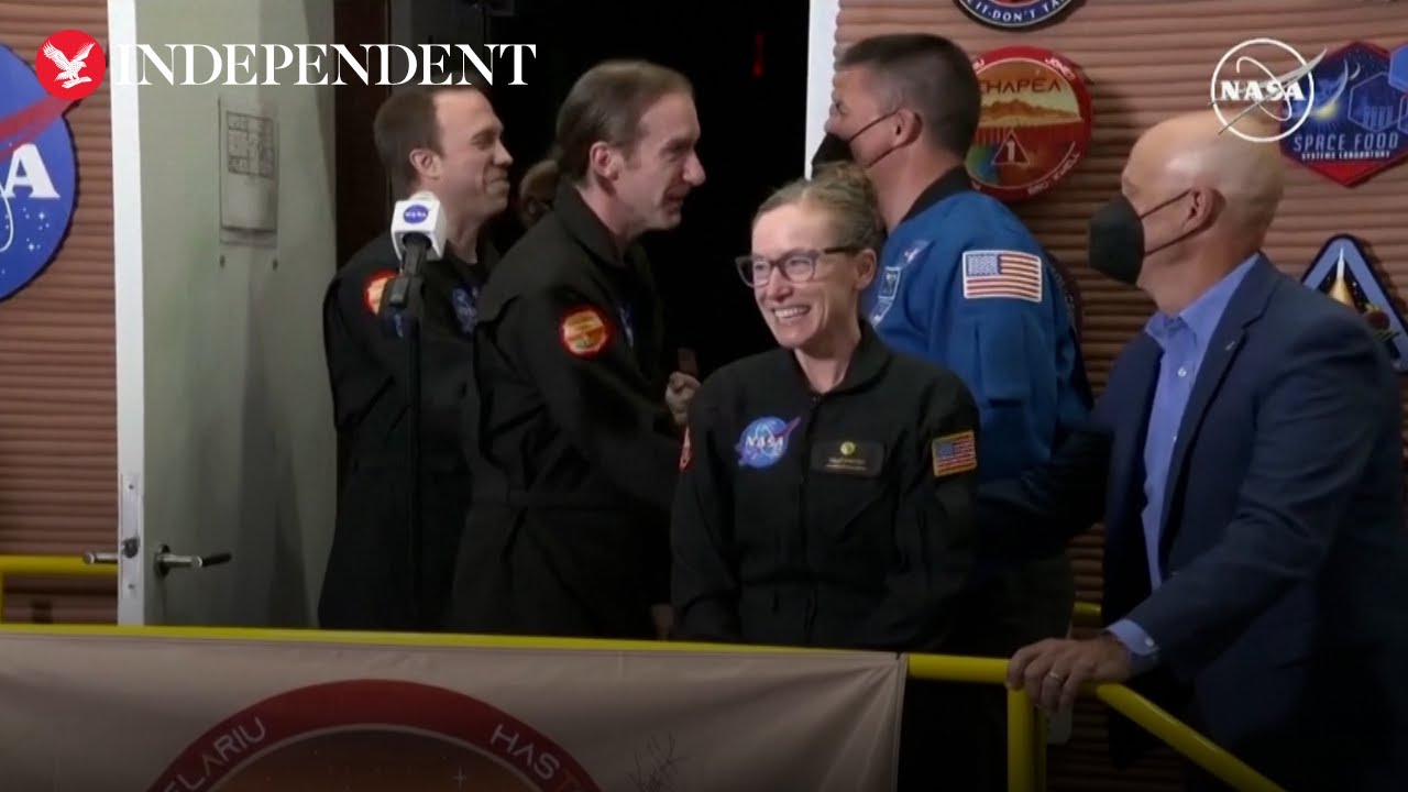 Volunteer crew all smiles as they emerge from Mars simulator for first time in 378 days - YouTube