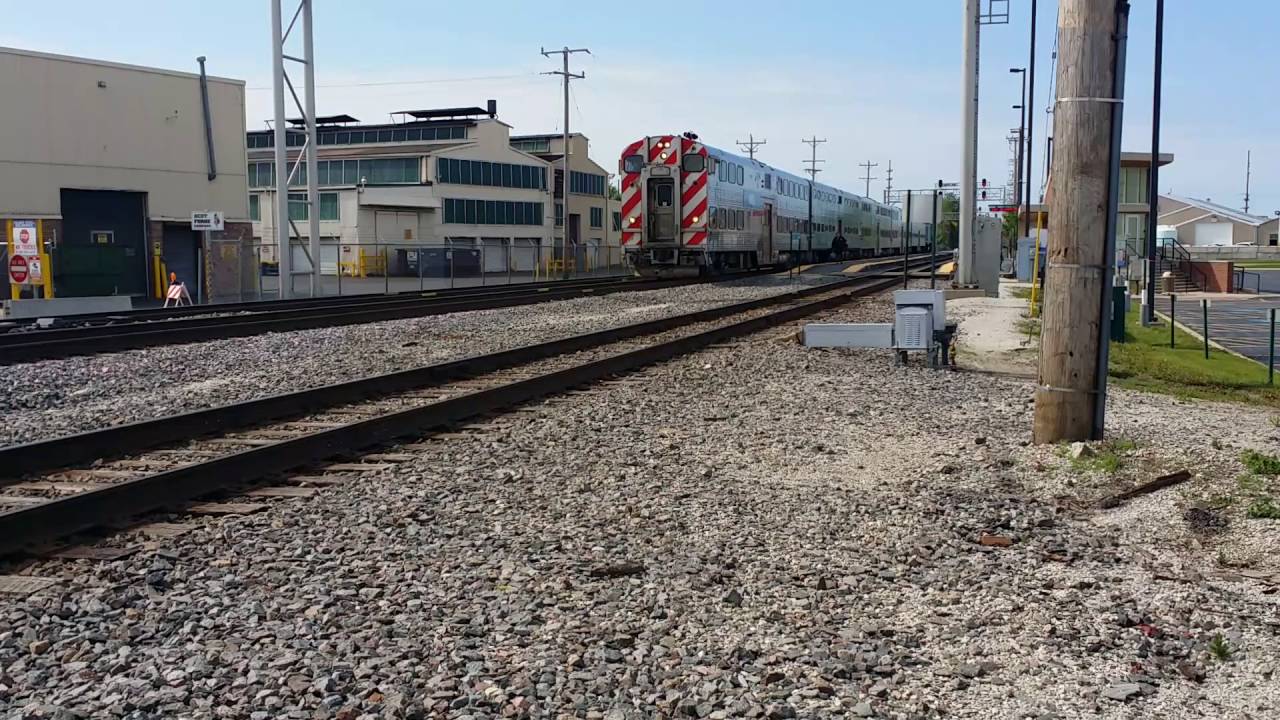 Metra F40PH 118 pushes inbound train number 116 through Belmont Ave ...