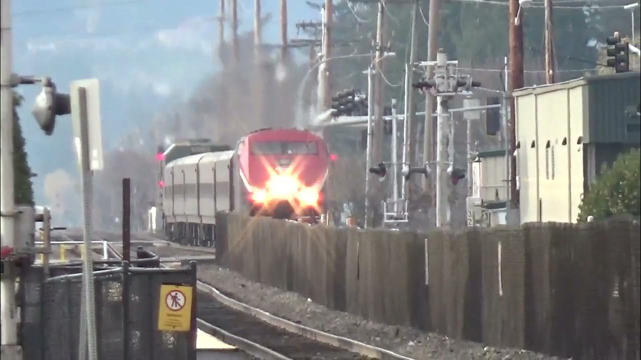 (NB) Amtrak 187 Phase VII Paint Scheme leads 504 through the 3RD Street S.E. Railroad Crossing ...