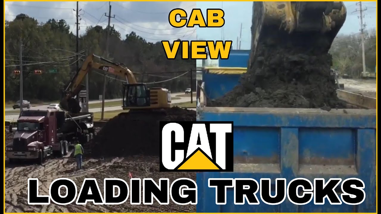 CAT excavator loading trucks cab view - YouTube