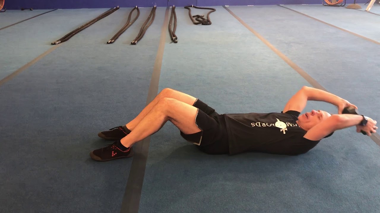 Dumbbell crunch and press - YouTube