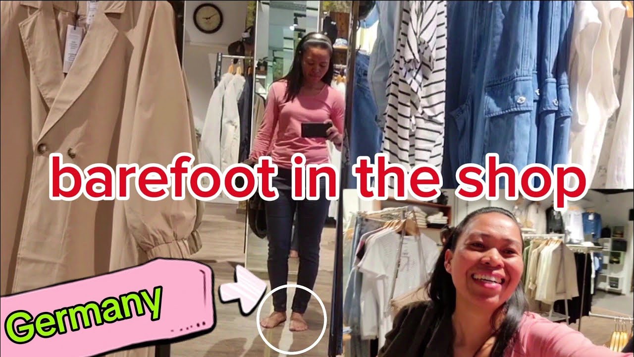 barefoot in the shop of germany / barefoot walking around / window ...