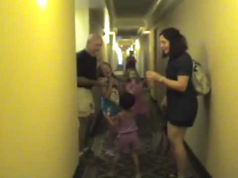 Girl scared when people jump out from behind a corner to surprise her ...