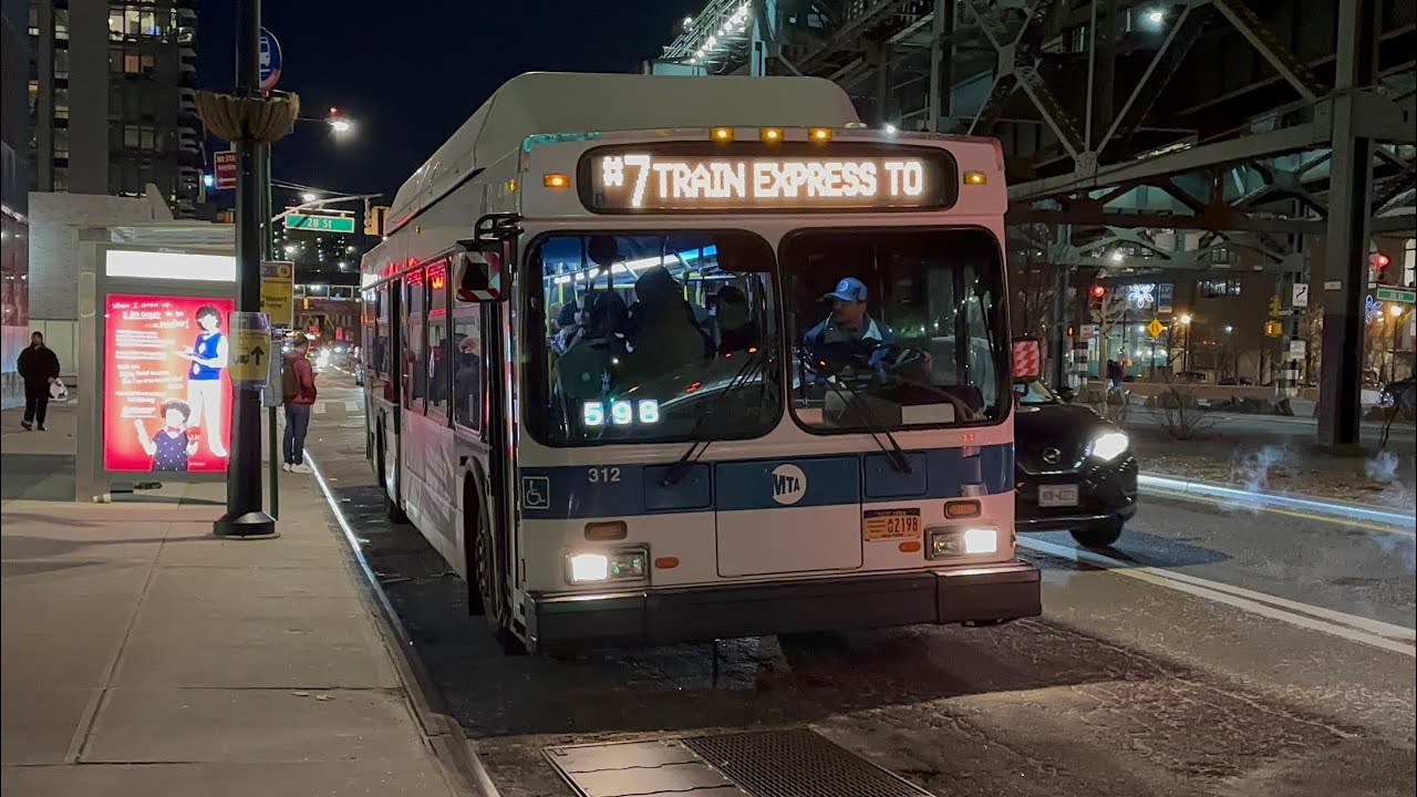 2011 Spectrum Sign New Flyer C40lf #312 on the Q107 7 Shuttle Leaving ...