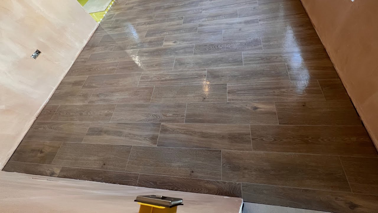 Installation of wood effect tiles. - YouTube