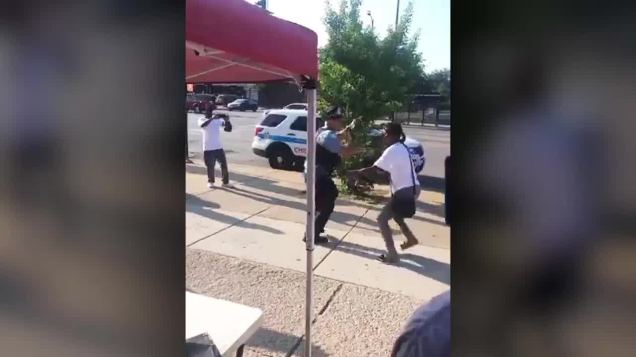 WATCH: Video of Woman and Chicago Police Officer Dancing Goes Viral ...