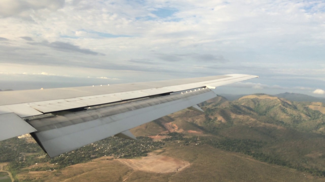 wing view landing B767 in port moresby PNG - YouTube