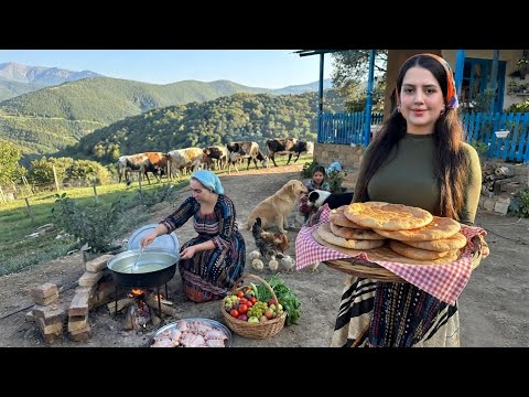 IRAN village life; Baking bread and fried chicken with vegetables