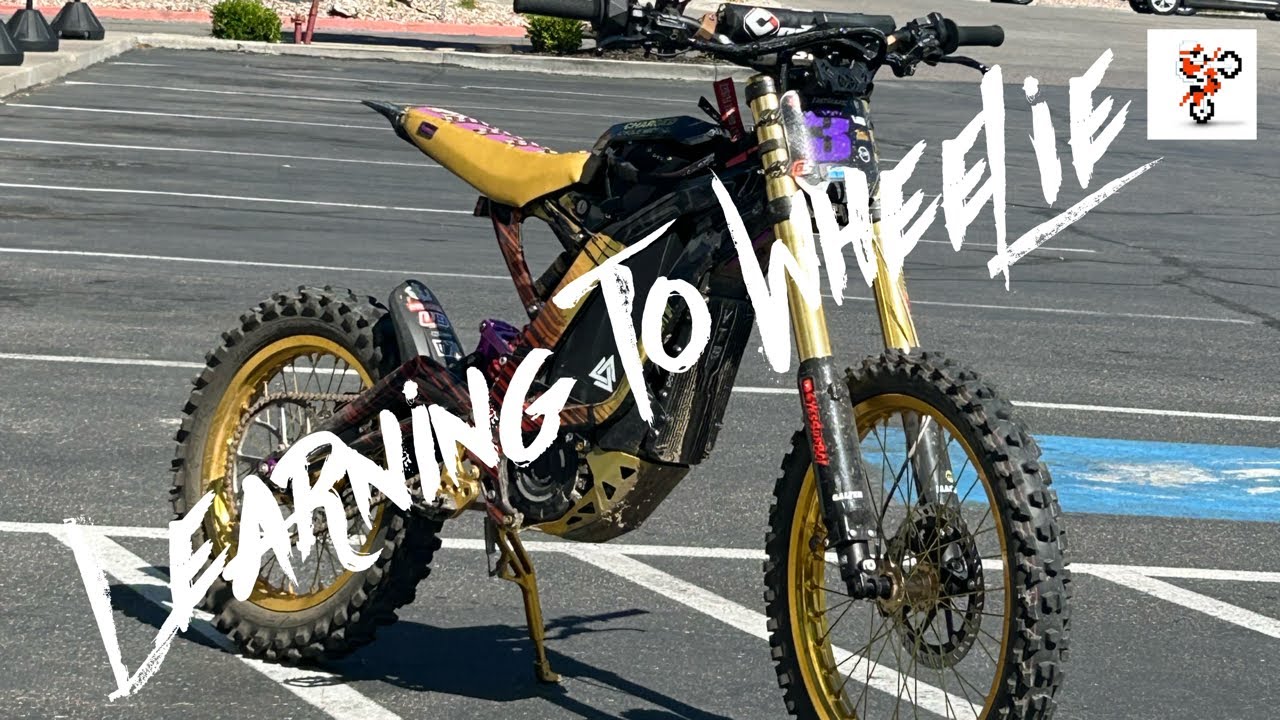 Learning to Wheelie my SURRON LBX - YouTube