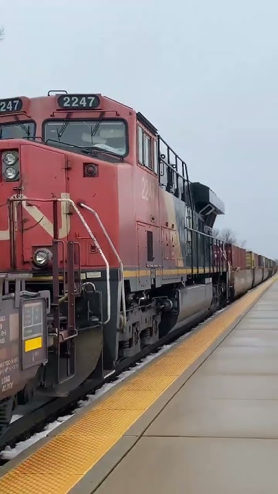 CN 2247 pushes a intermodal through Prairie crossing - YouTube