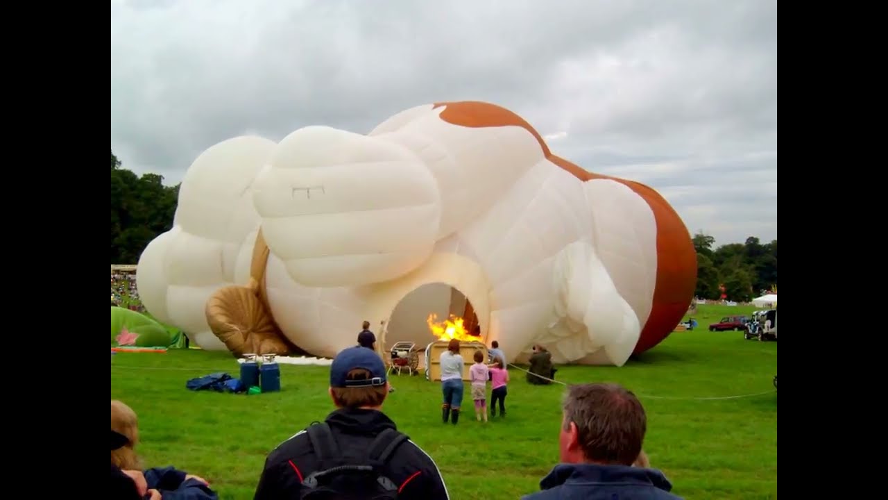 Churchill Dog Special Shape Balloon Inflation BIBF Time Lapse - YouTube