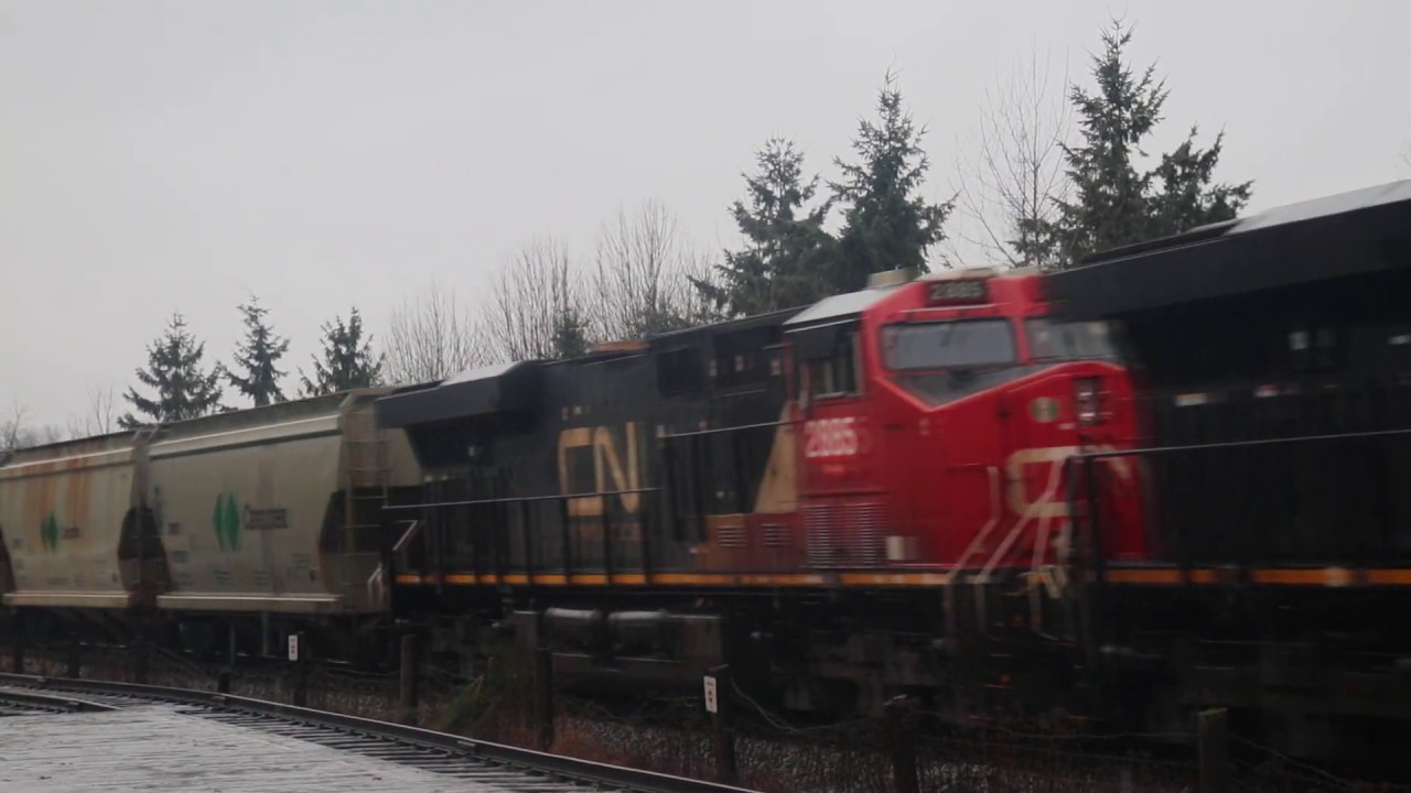 CN 3857 GEVO w/ Rear Train DPU Leads Canpotex Train At Fort Langley BC ...