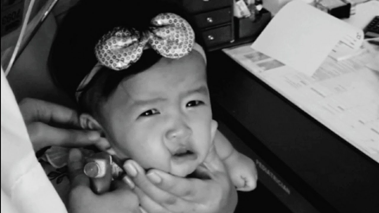 Baby's first EAR PIERCING. | CRY & SMILE - YouTube