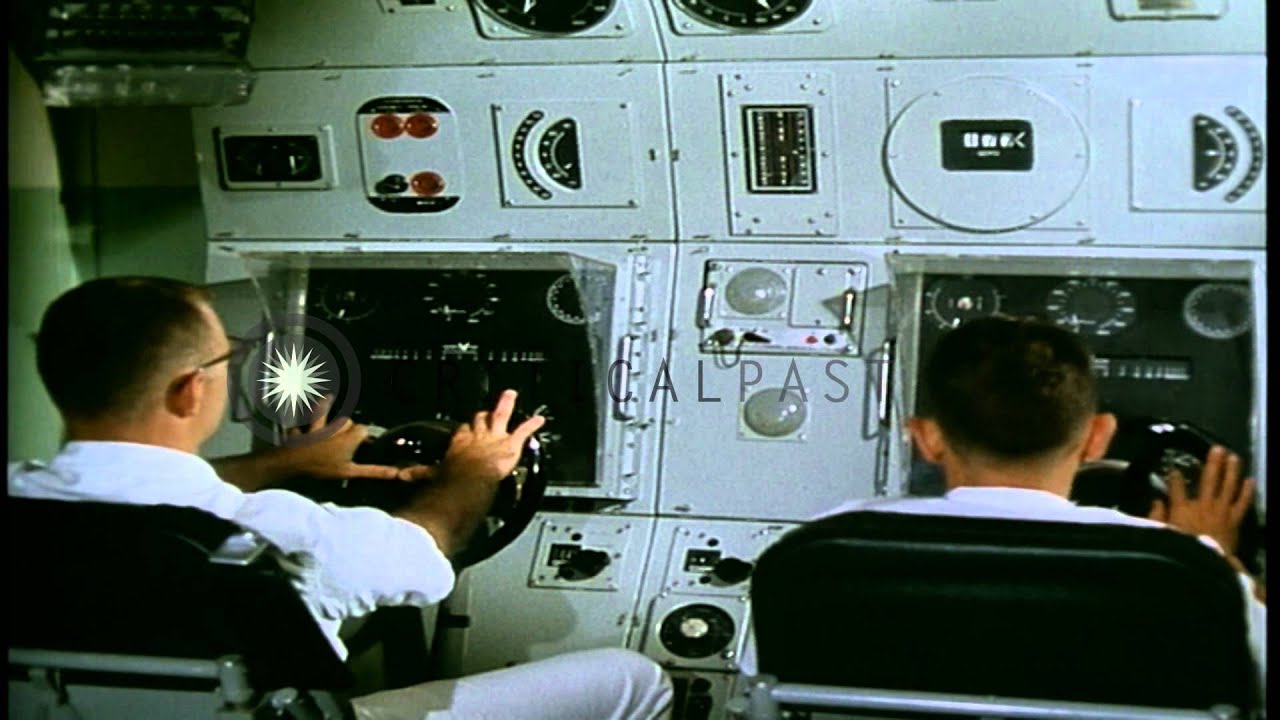 US Navy officers and men at control panel aboard ballistic missile ...